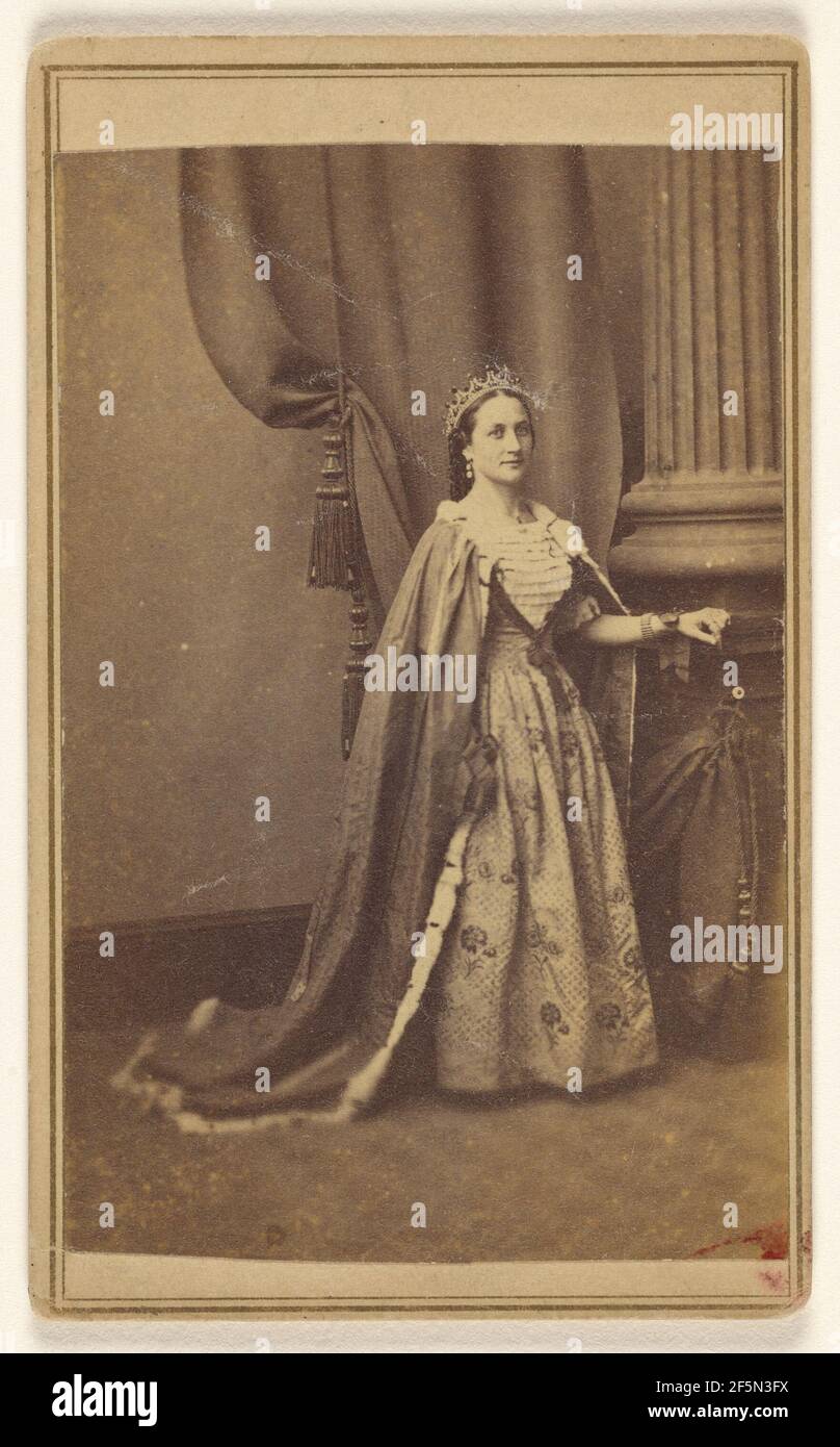 Unidentified woman wearing a tiara and cape, standing. Orrin C ...