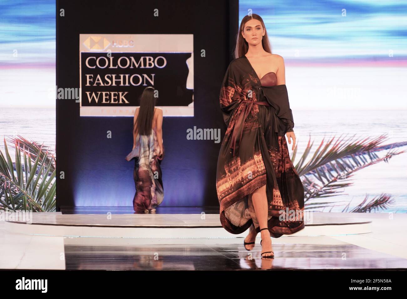 Colombo, Sri Lanka. 26th Mar, 2021. A model presents a creation during ...
