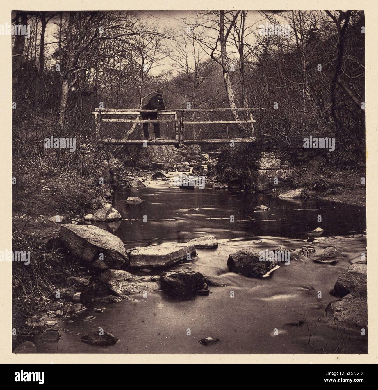 Man on bridge hi-res stock photography and images - Alamy