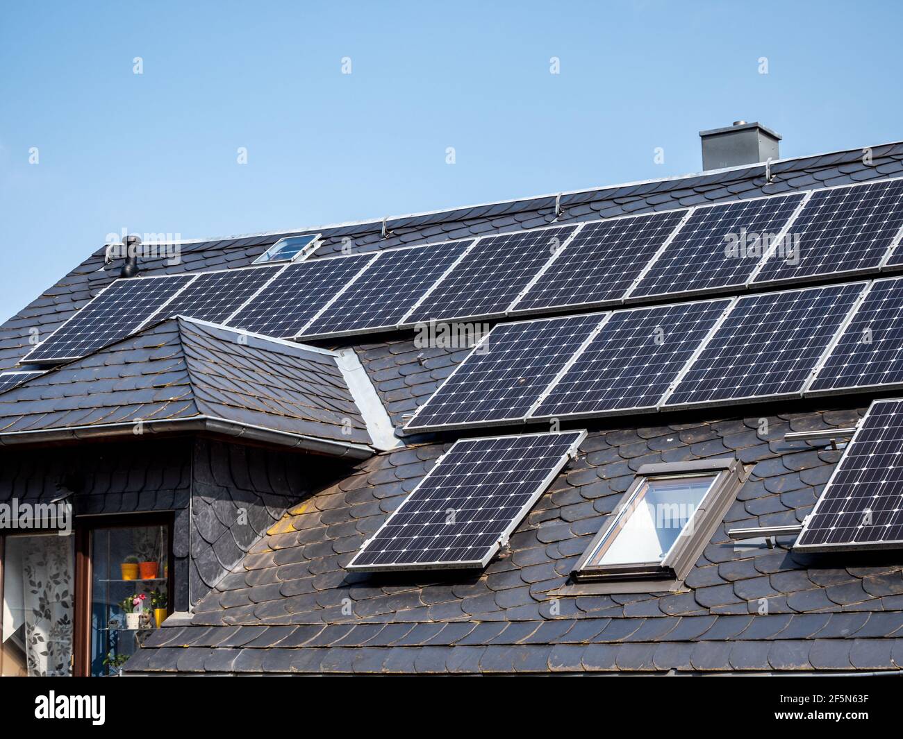 Photovoltaic solar panel on the roof Stock Photo - Alamy