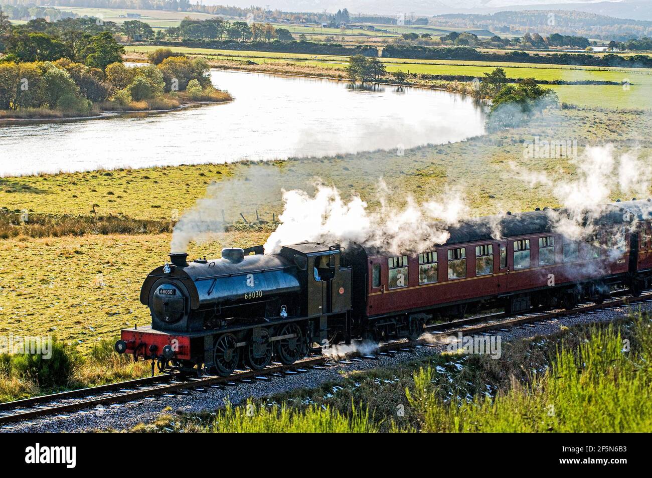 The Strathspey Steam Railway near Broom hill station as it passes the ...