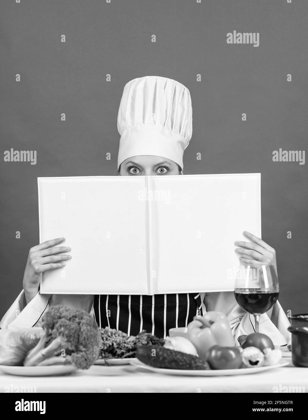 Woman can food cooking Black and White Stock Photos & Images - Alamy