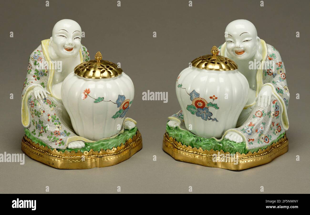Pair of Magot Figures Stock Photo - Alamy