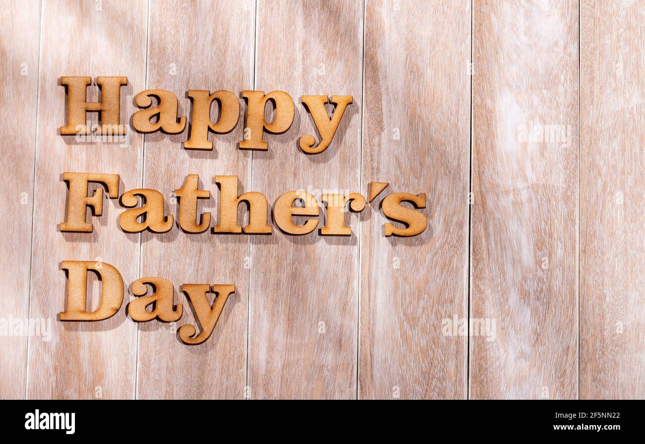 Happy Father's Day text on rustic white wooden background. greeting ...