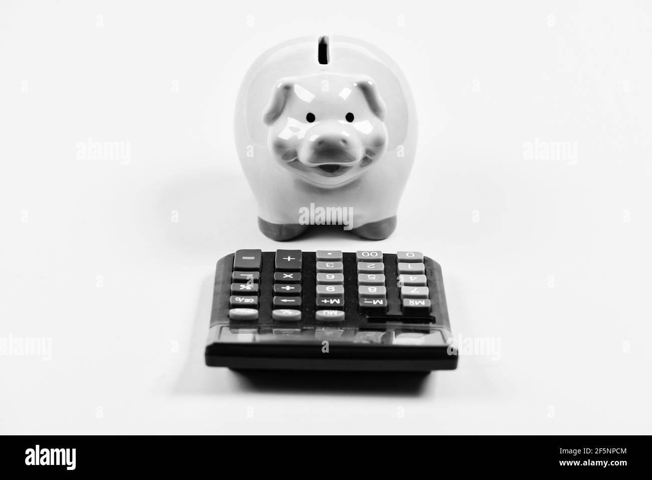 moneybox with calculator. Piggy bank. planning and counting budget ...