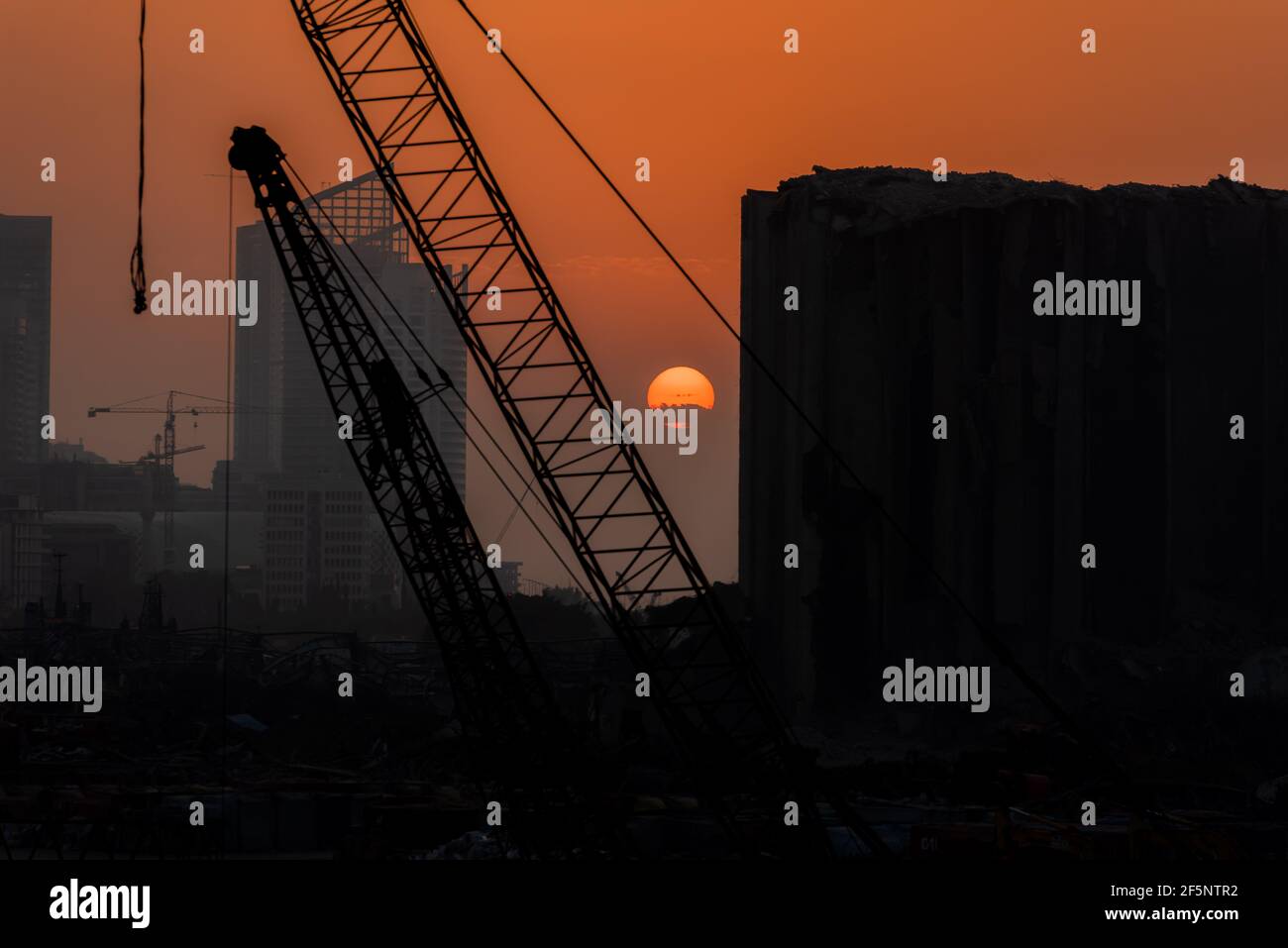 Beirtu Port Sunset after 4th of August explosion Stock Photo - Alamy