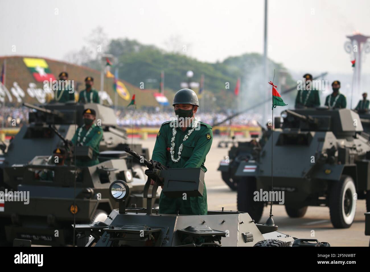 Nay Pyi Taw, Myanmar. 27th Mar, 2021. Military vehicles march in a ...
