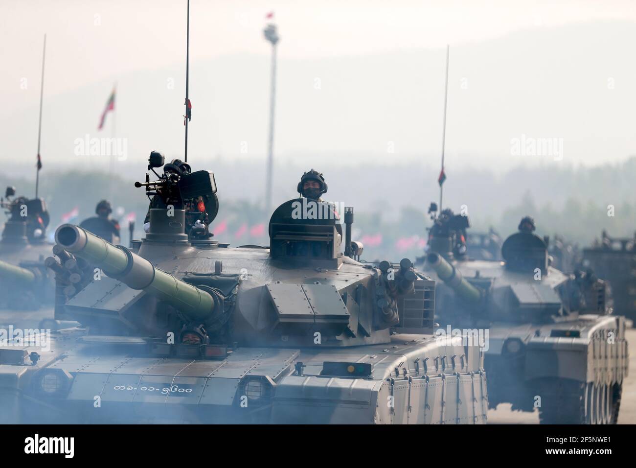 Nay Pyi Taw, Myanmar. 27th Mar, 2021. Military vehicles march in a ...