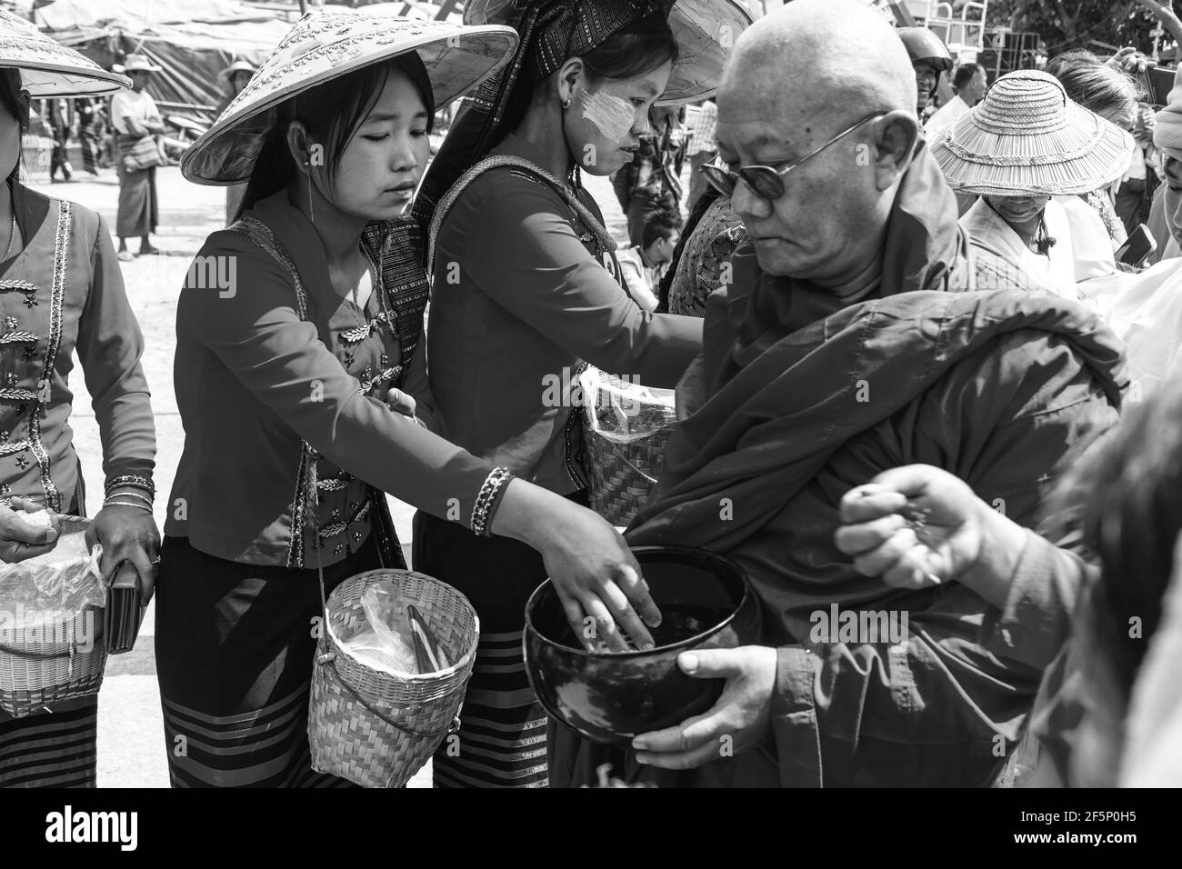 Giving alms Black and White Stock Photos & Images - Alamy