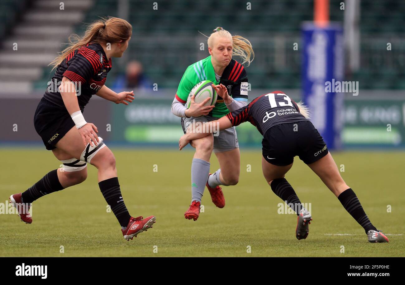 Harlequins Heather Cowell is tackled by Saracens Hannah Casey during ...
