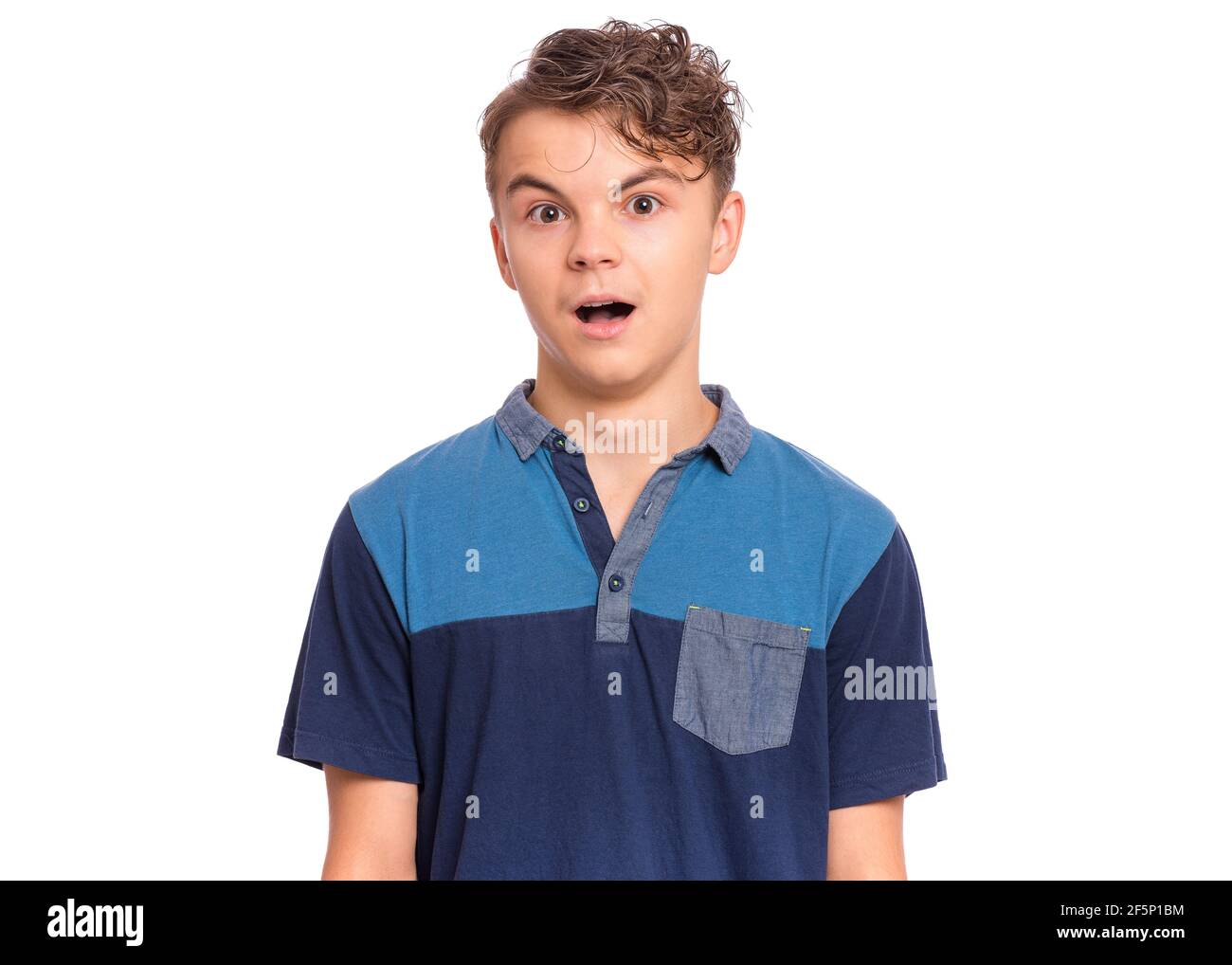 Emotional portrait of scared boy teenager, isolated on white background ...