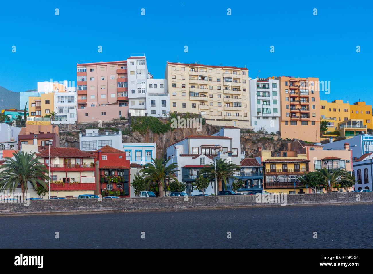 Colorful houses behind the central beach at Santa Cruz de la Palma ...