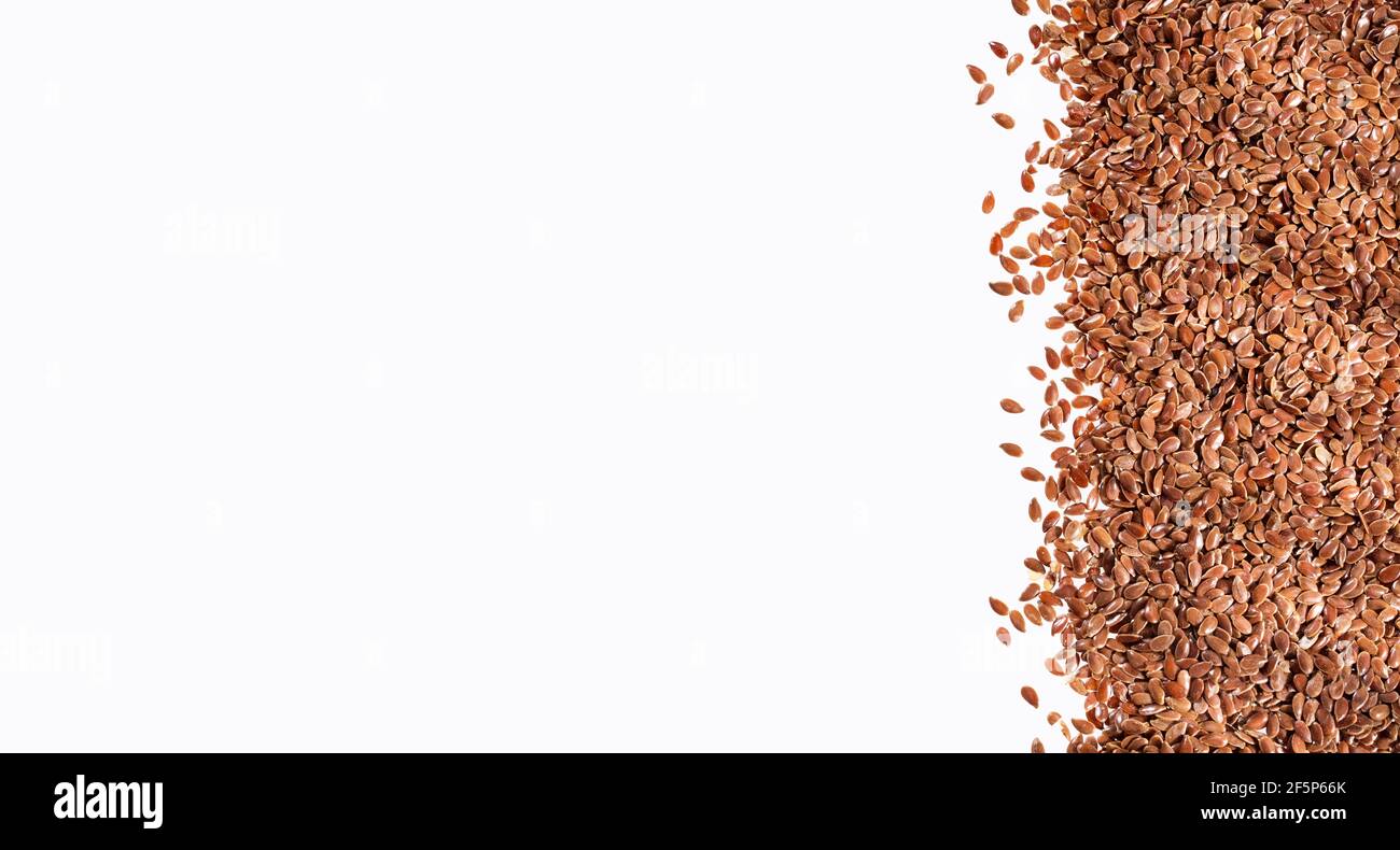 Organic flax seeds - Linum usitatissimum. Text space Stock Photo - Alamy