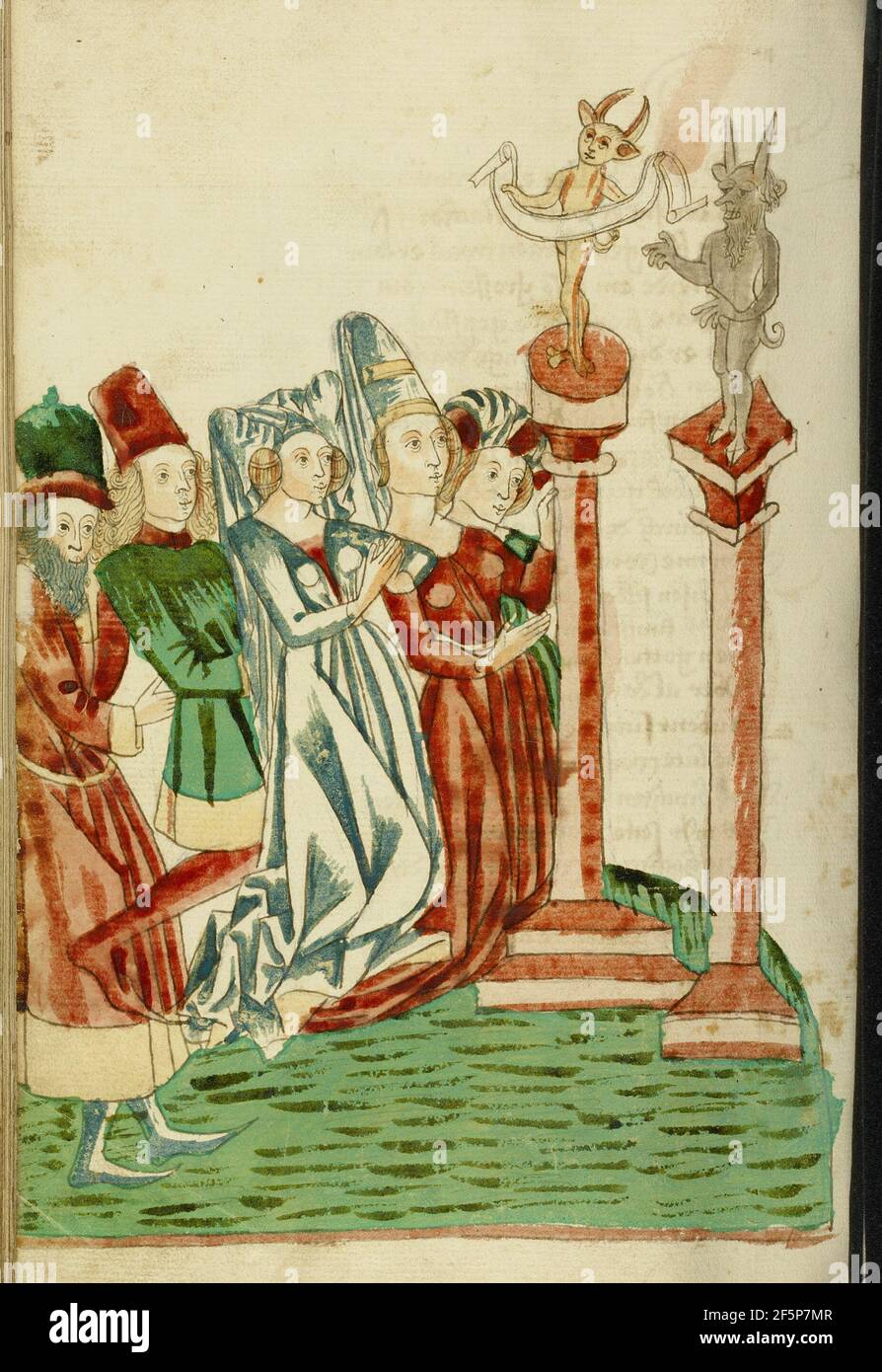 A Group of Men and Women Worship Two Idols Stock Photo - Alamy