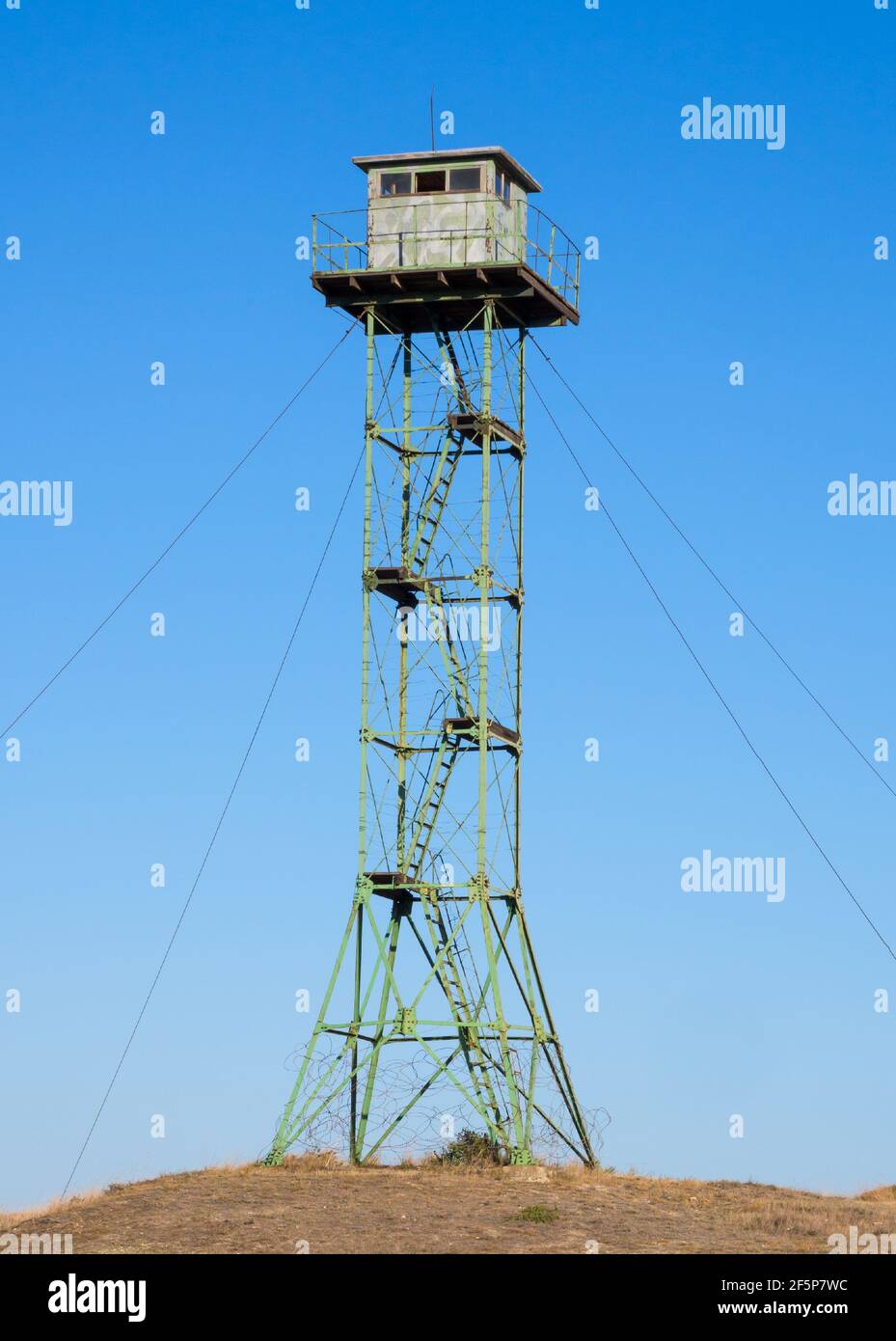 Observation (guard) tower against the backdrop of a clear sky Stock ...