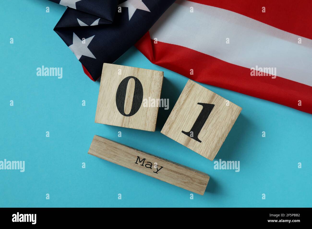 American flag and wood calendar with 1 may on blue background Stock ...