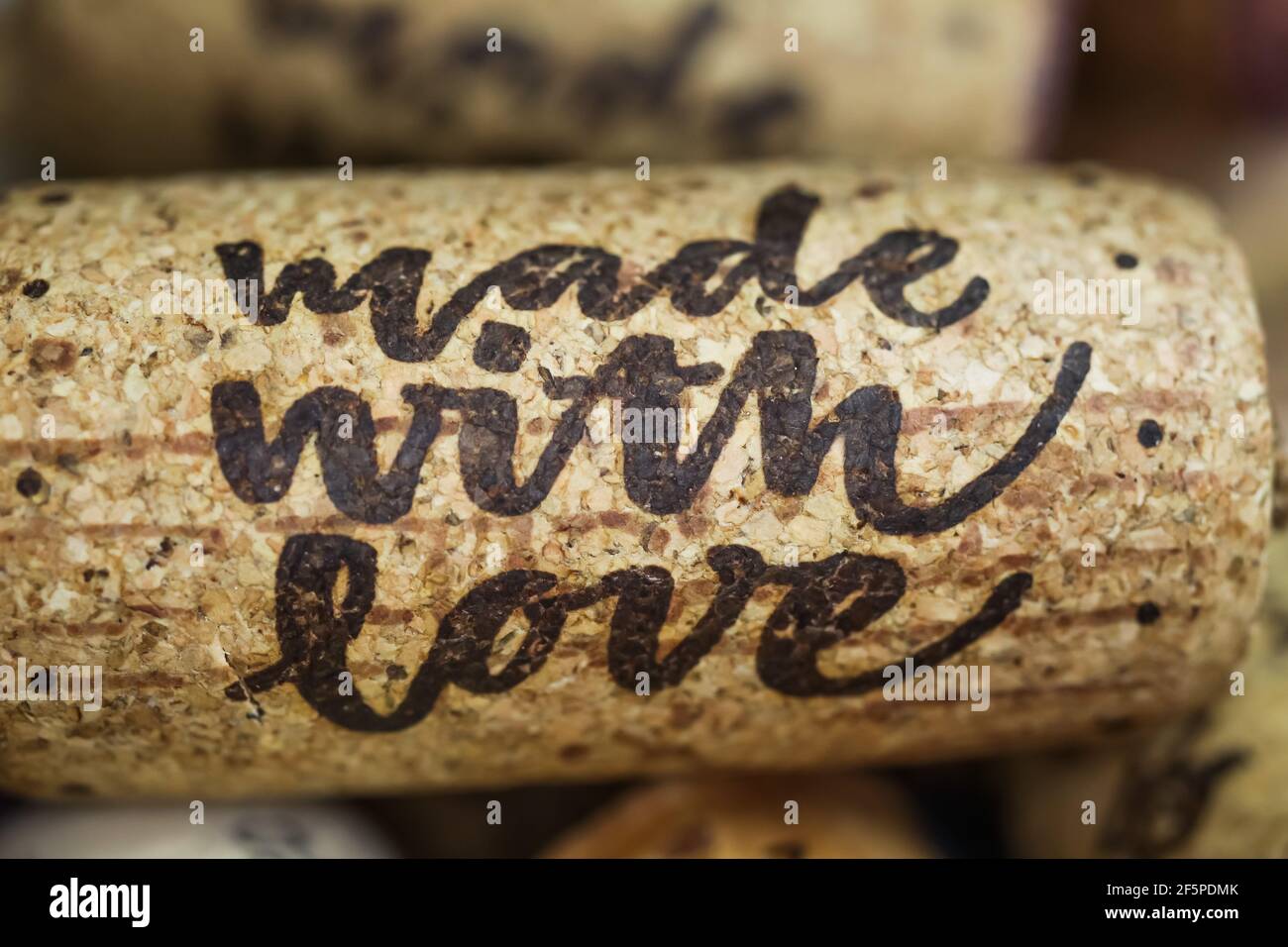 Close up of isolated natural wine cork with text made with love Stock ...
