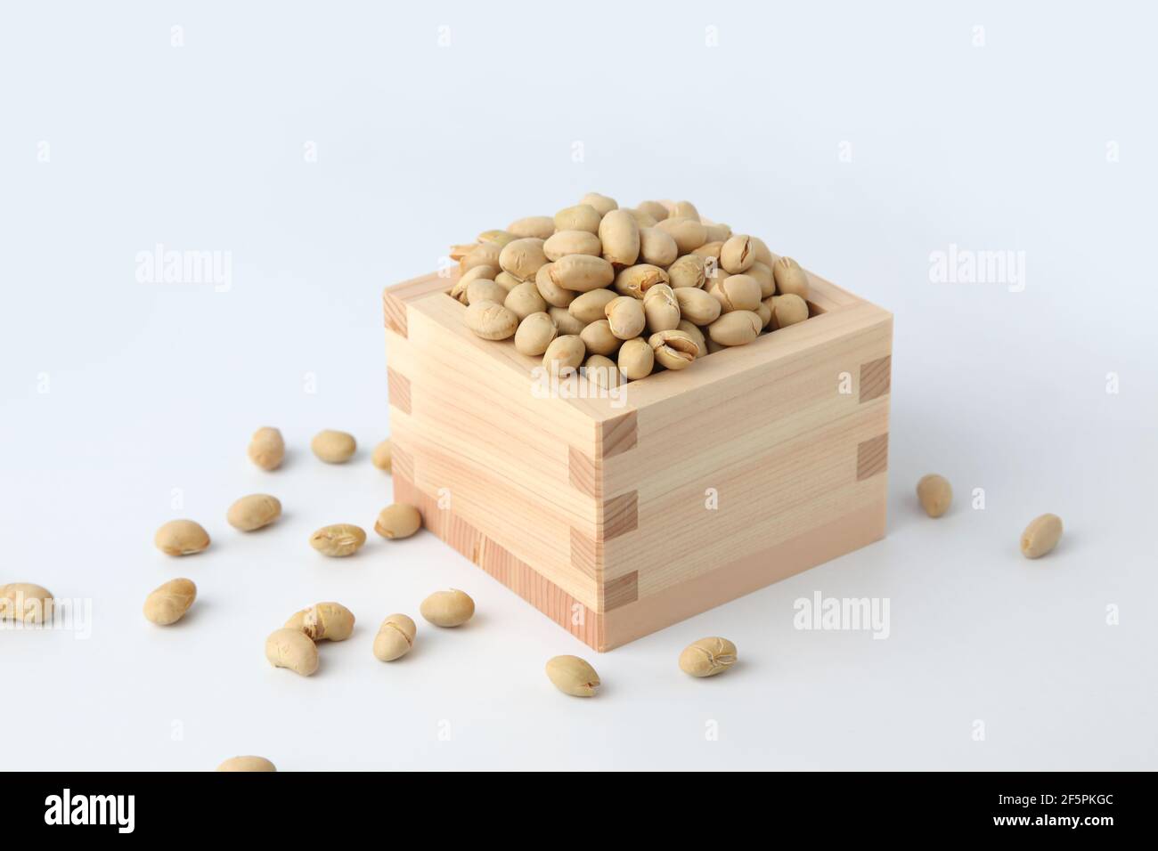 parched soy beans in measuring box isolated on white background Stock ...