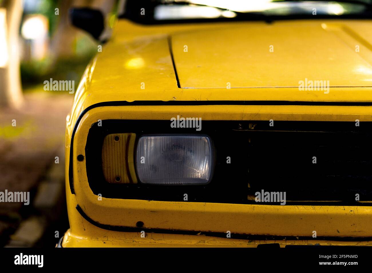 front light details of an antique yellow car Stock Photo - Alamy