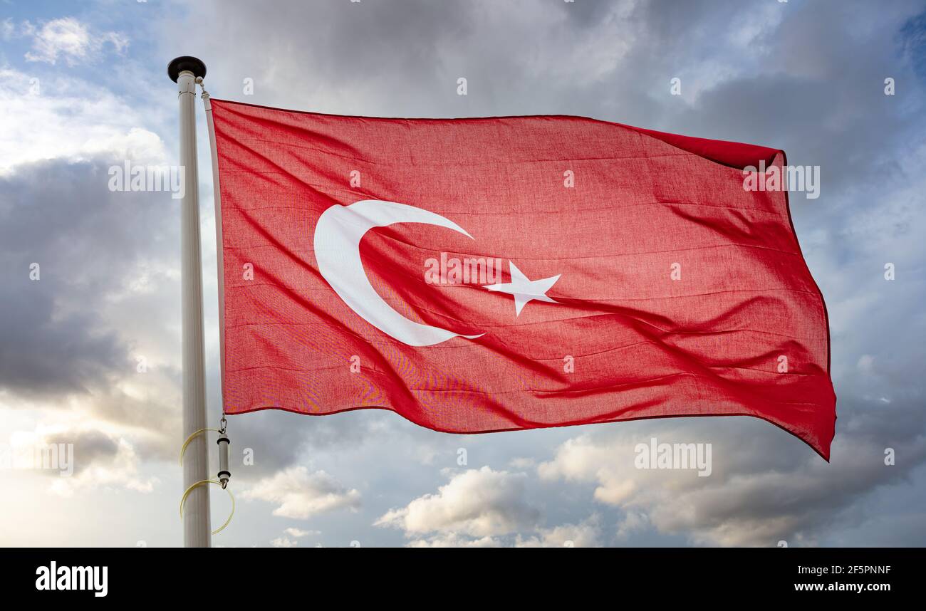 Turkey sign symbol. Turkish national flag on a pole waving against ...