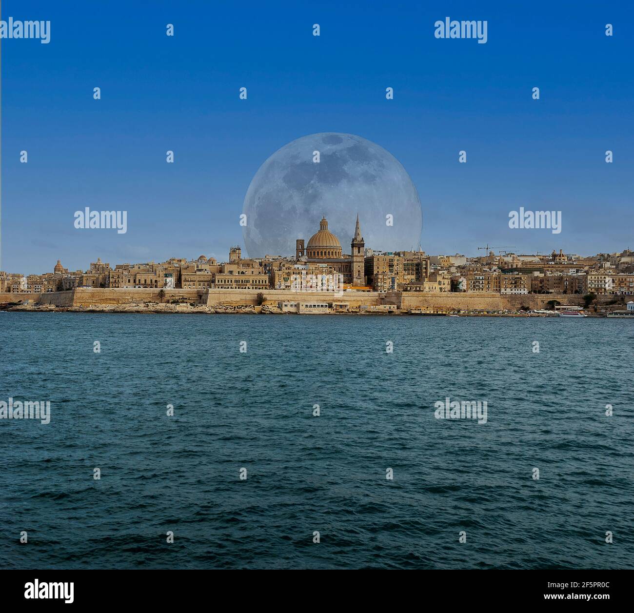 A full moon over the skyline of Valletta harbour in Malta Stock Photo ...