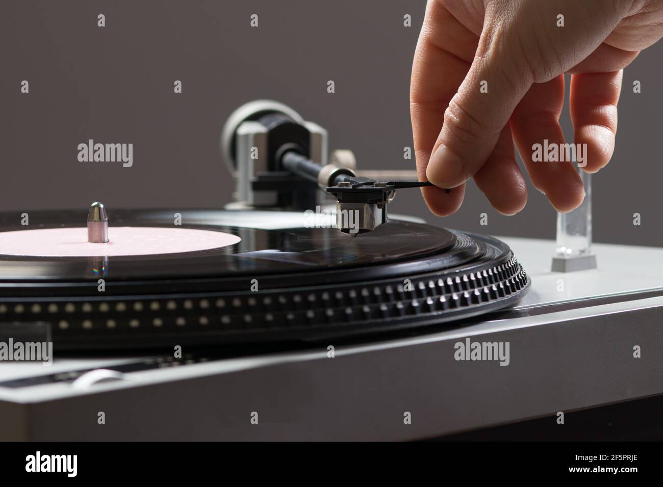 Female record record player hi-res stock photography and images - Alamy