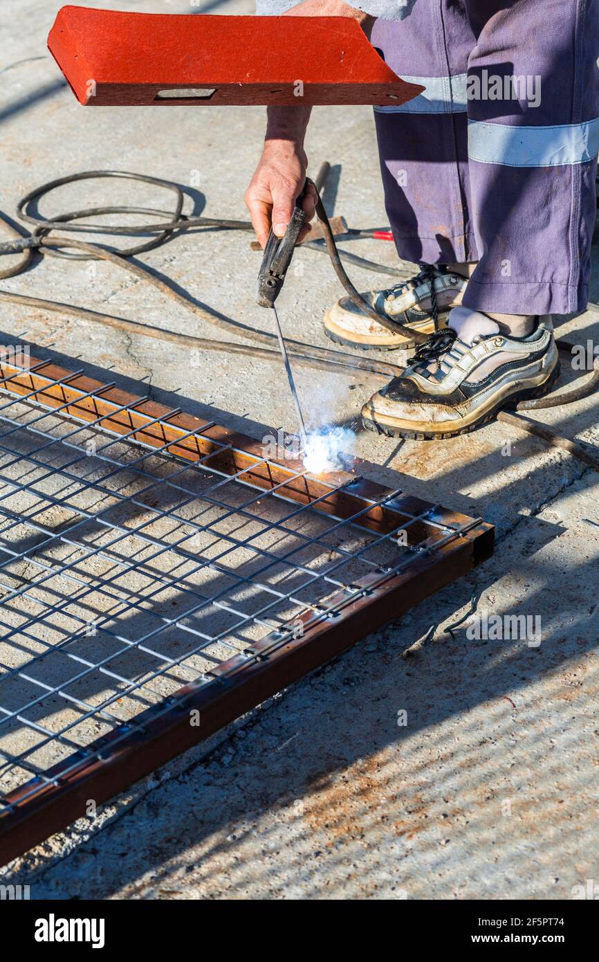 Metalworking master doing electricity welding in Turkey Stock Photo - Alamy