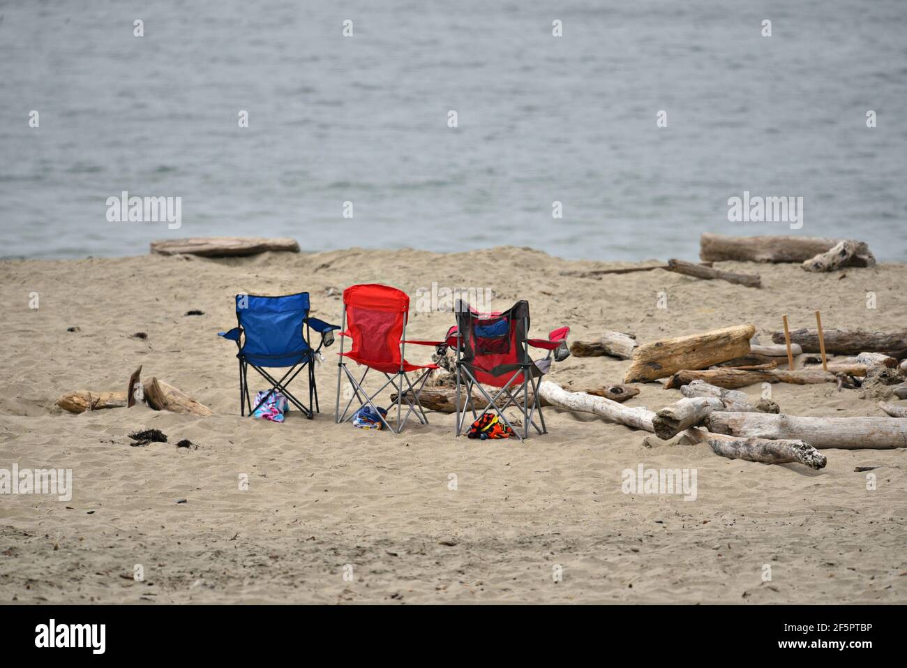 Beach chairs on the shoreline of Seacliff State Beach in Aptos ...