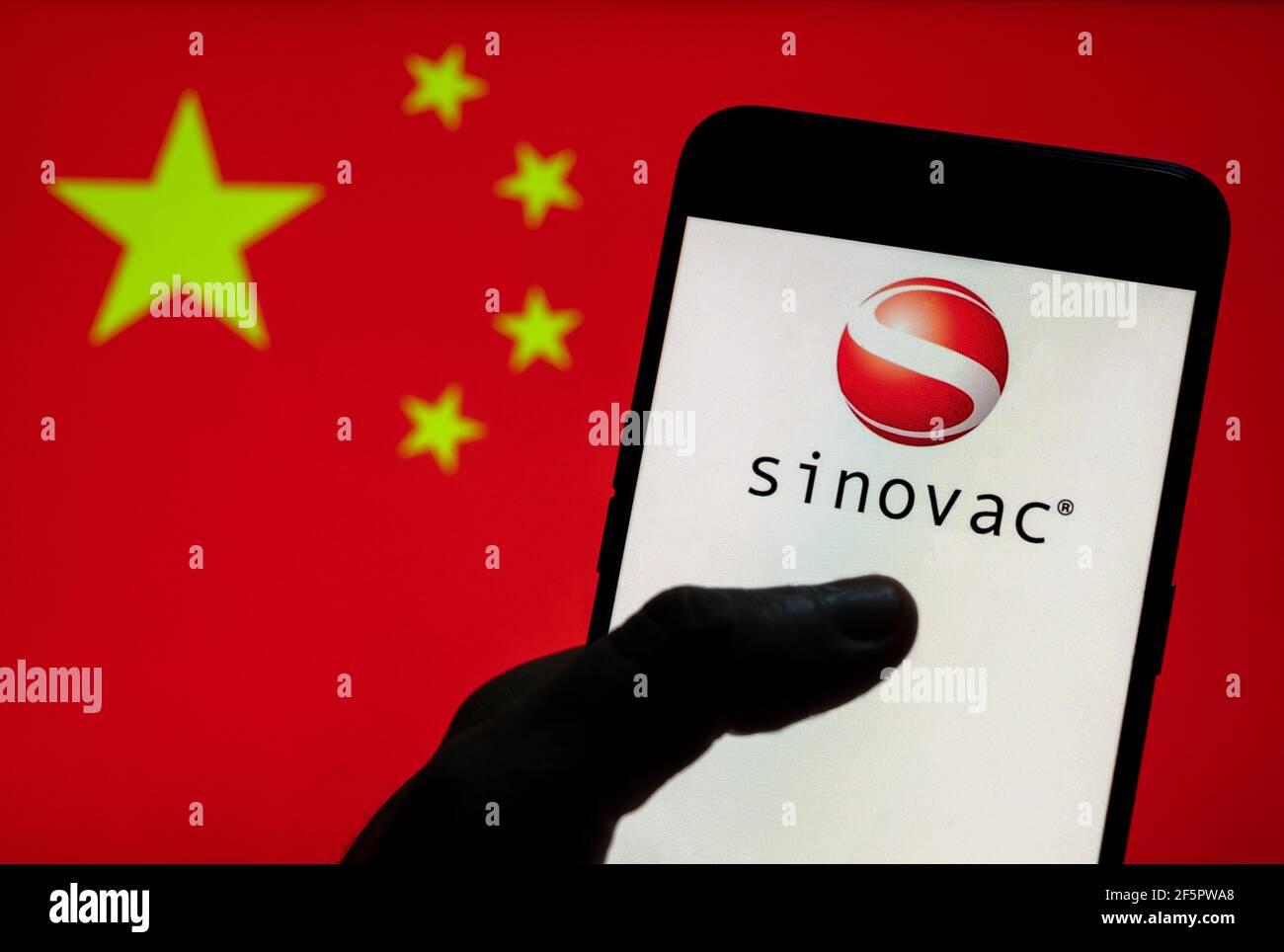 In this photo illustration, the Chinese Sinovac vaccine logo for Covid ...