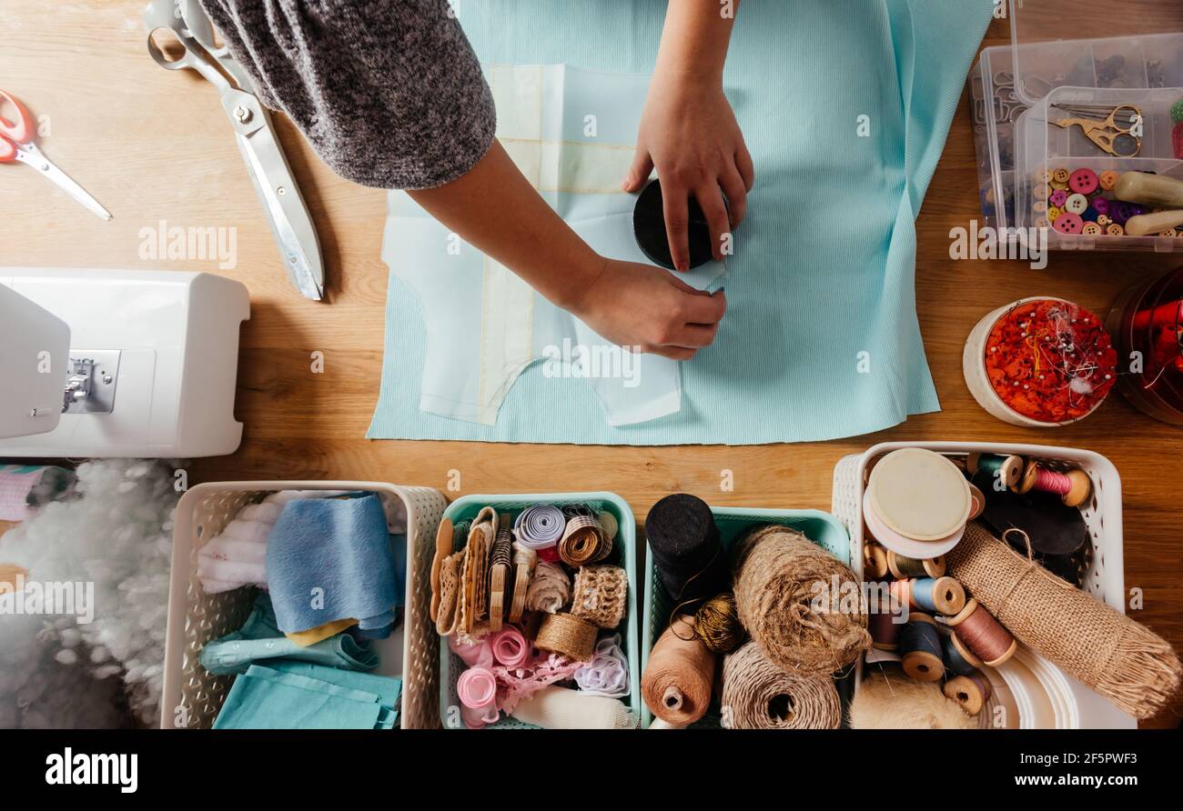 Designing and creating children clothes at home Stock Photo - Alamy