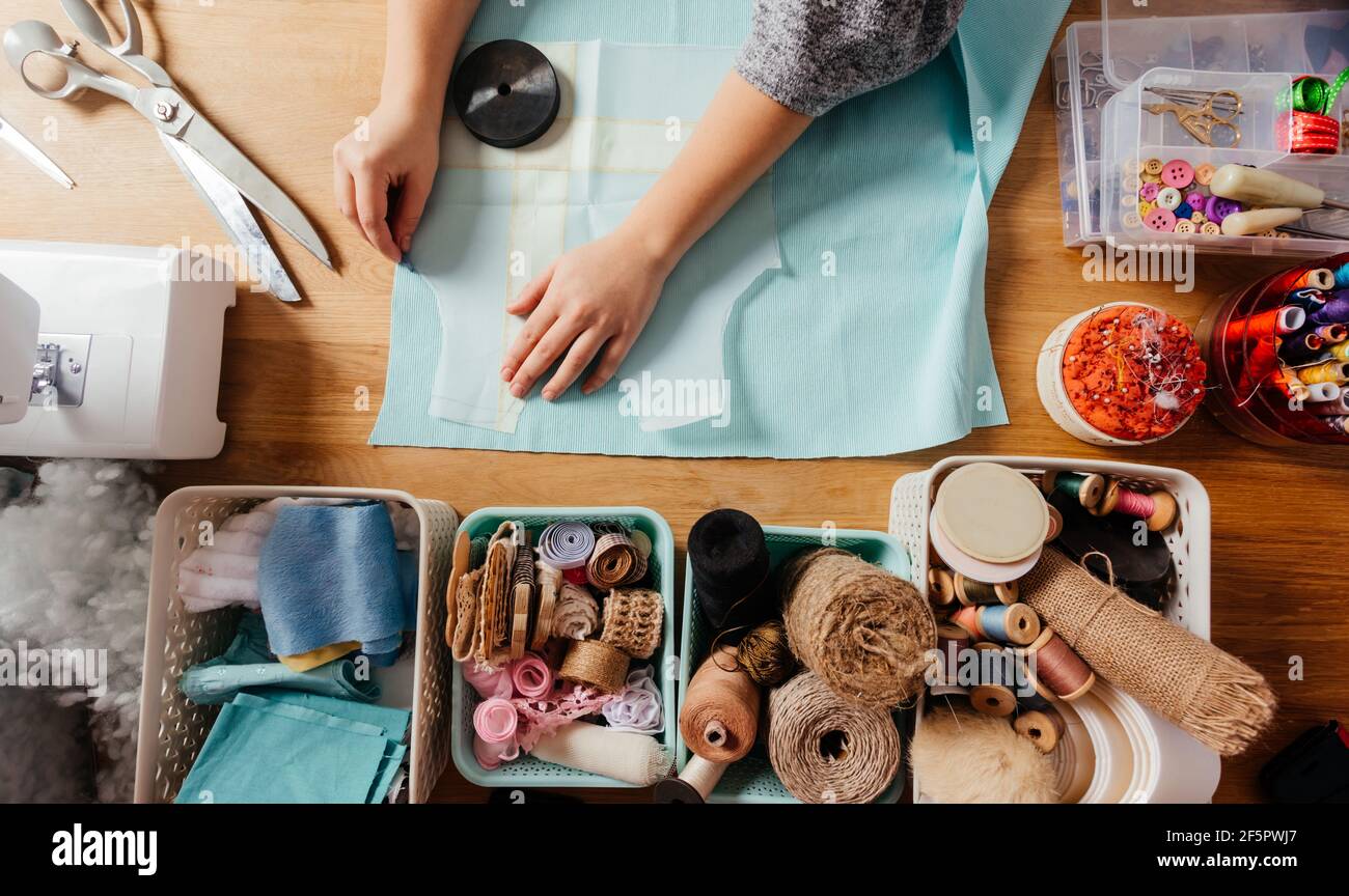 Designing and creating children clothes at home Stock Photo - Alamy