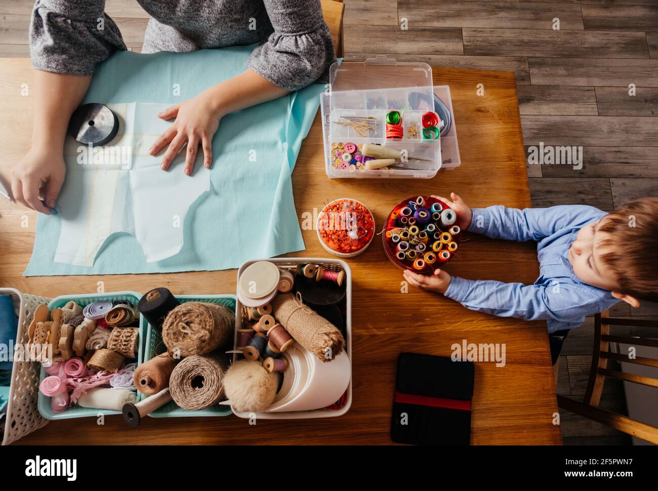 Designing and creating children clothes at home Stock Photo - Alamy