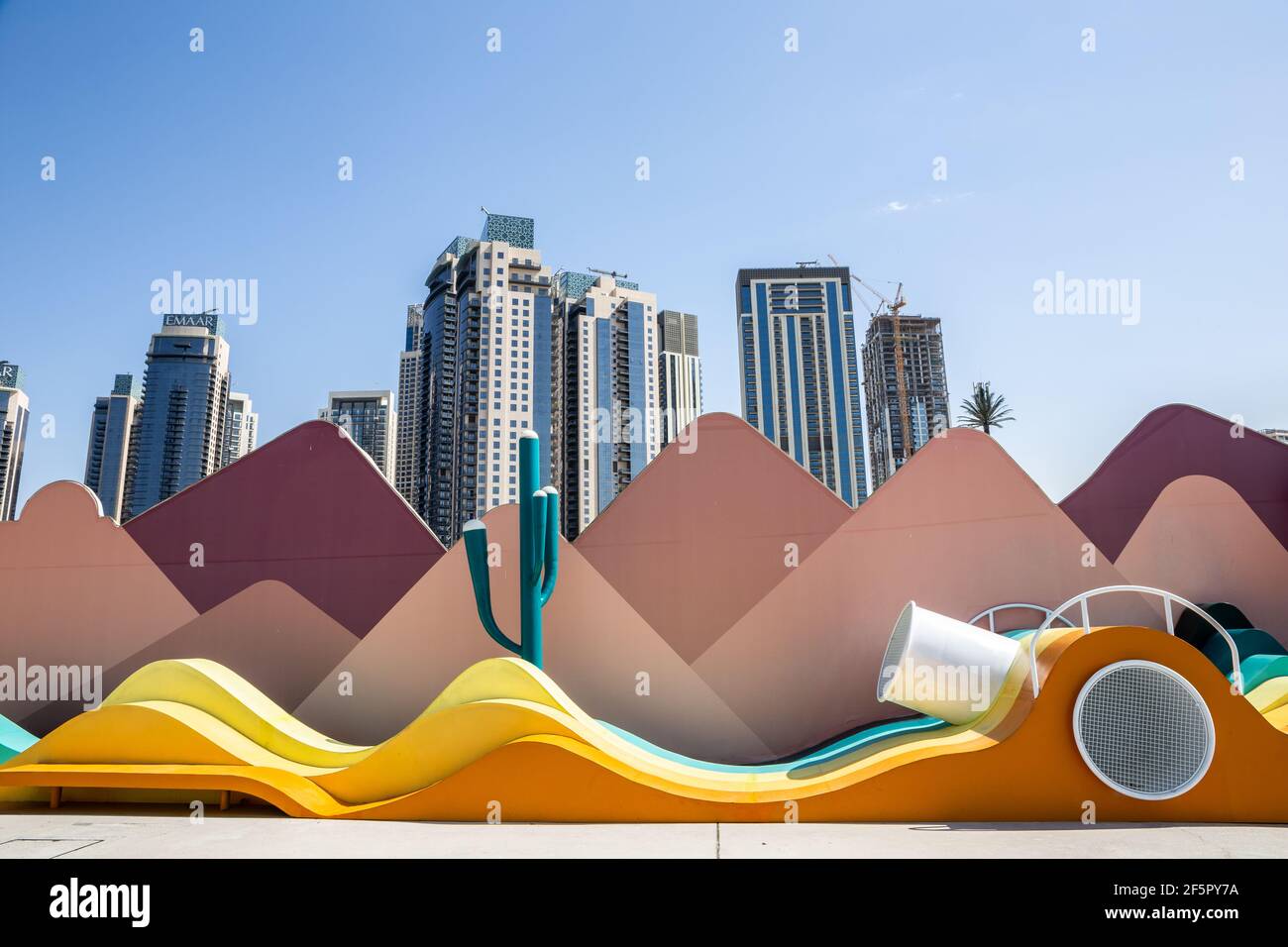 Dubai, UAE, 22.02.2021. Modern art installations with sand dunes and ...