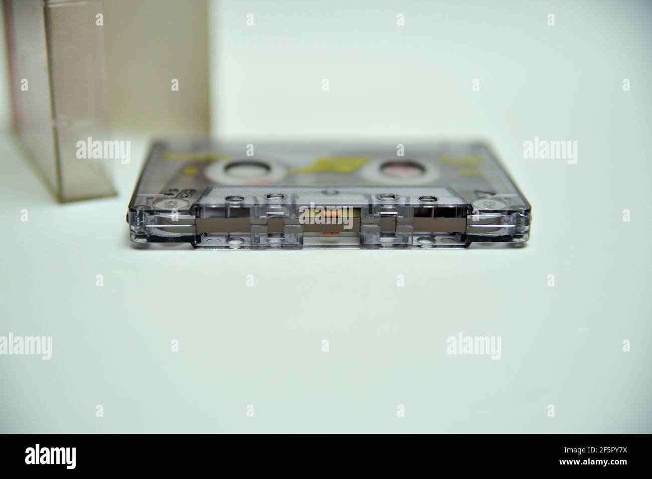 Audio cassette on white surface Stock Photo - Alamy