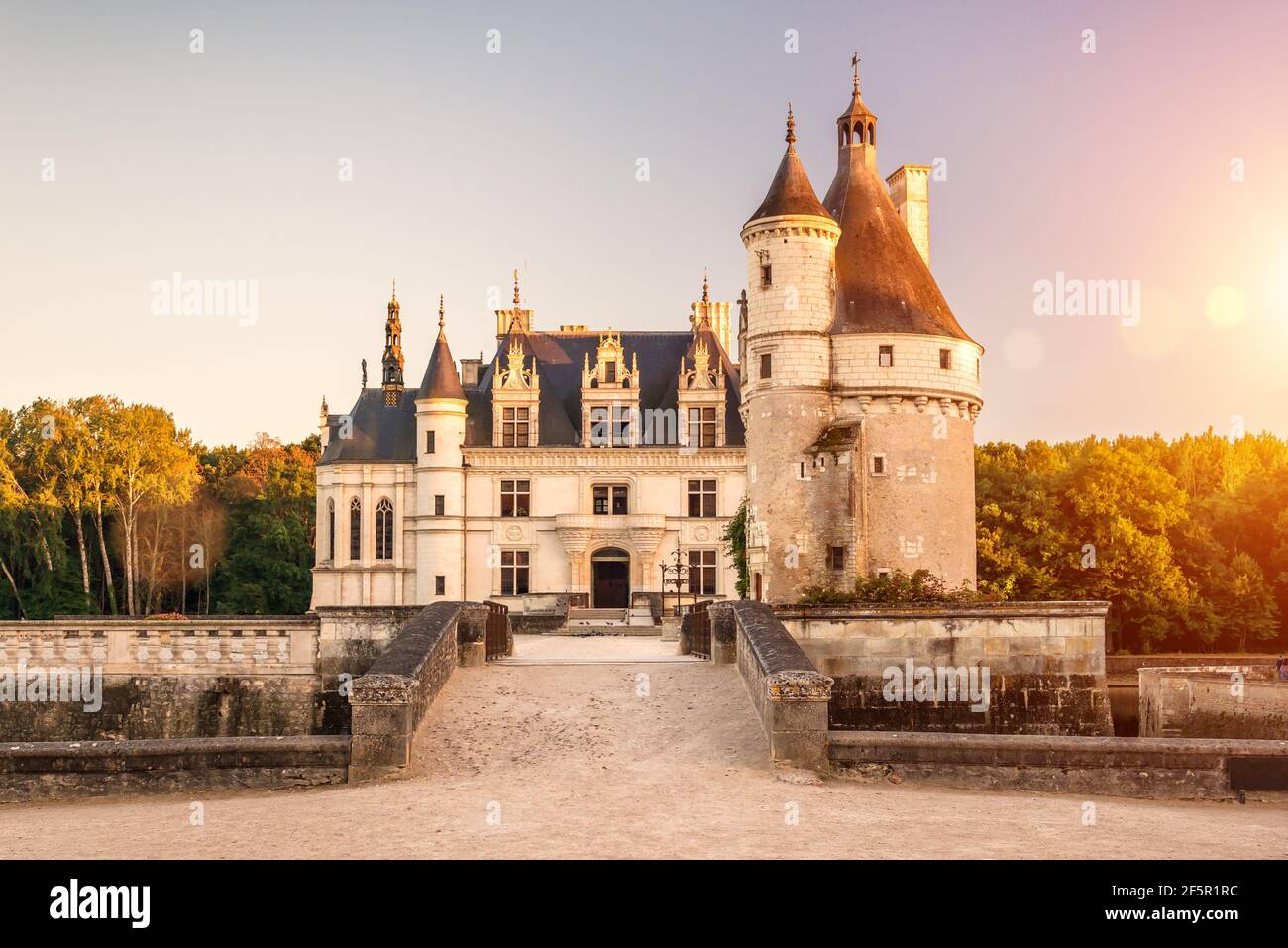 Castle chateau de Chenonceau at sunset, France. It is famous landmark ...