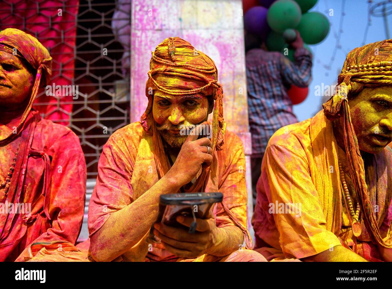 Mathura, Uttar Pradesh, India. 24th Mar, 2021. Hindu devotees with ...