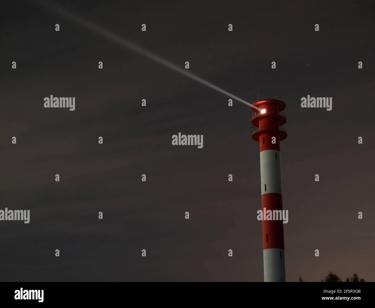 Lighthouse in the night hi-res stock photography and images - Alamy
