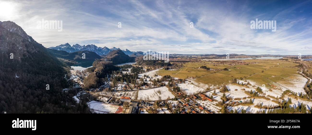 Aerial panorama drone shot of Alpine mountain range near Neuschwanstein ...
