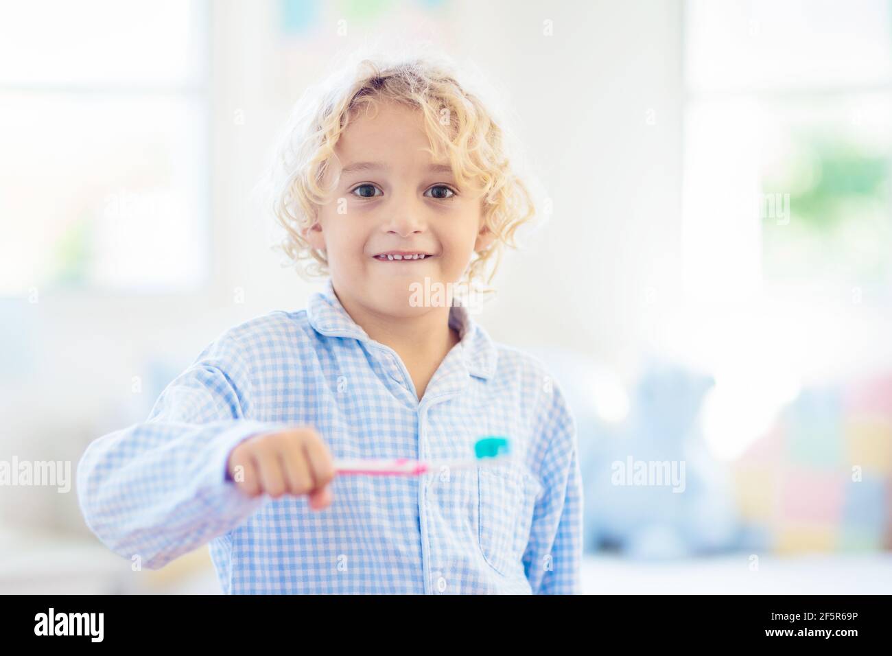 Child brushing teeth. Kids with toothpaste and brush. Dental and oral ...