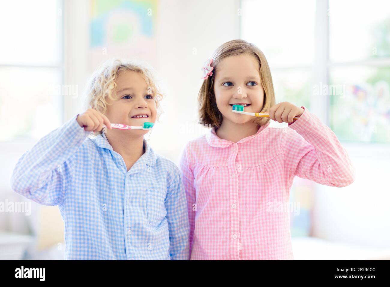 Child brushing teeth. Kids with toothpaste and brush. Dental and oral ...