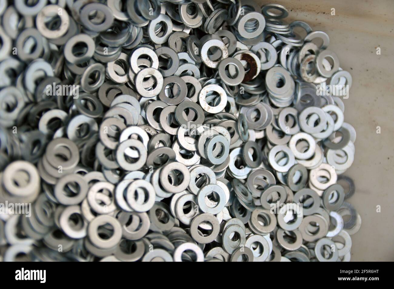 A set of mounting washers. Flat metal washer. Background, texture Stock ...
