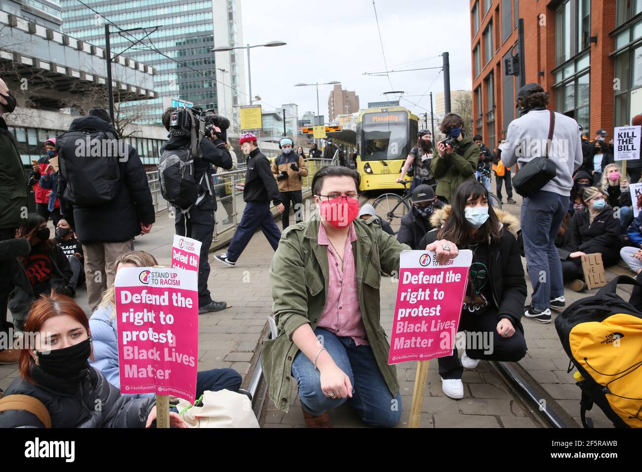 Manchester, UK. 27th March, 2021. Hundreds of protesters took to the ...