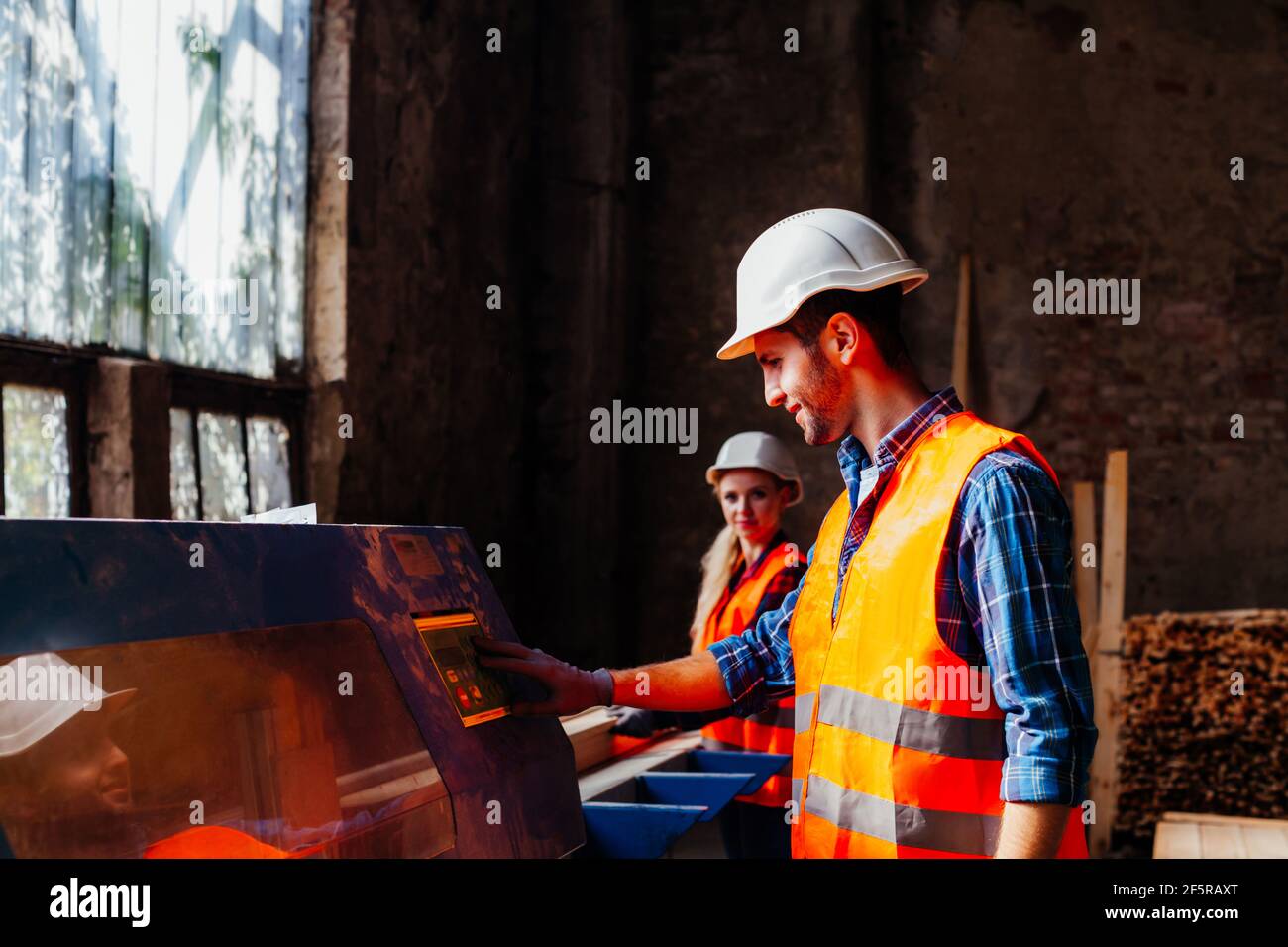 Cutting timber woman hi-res stock photography and images - Alamy