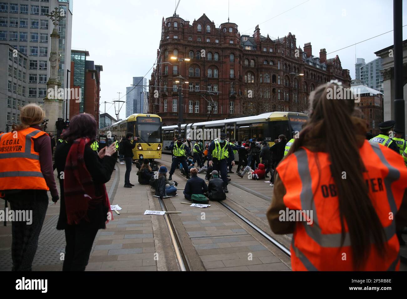 Manchester, UK. 27th March, 2021. Hundreds of protesters took to the ...