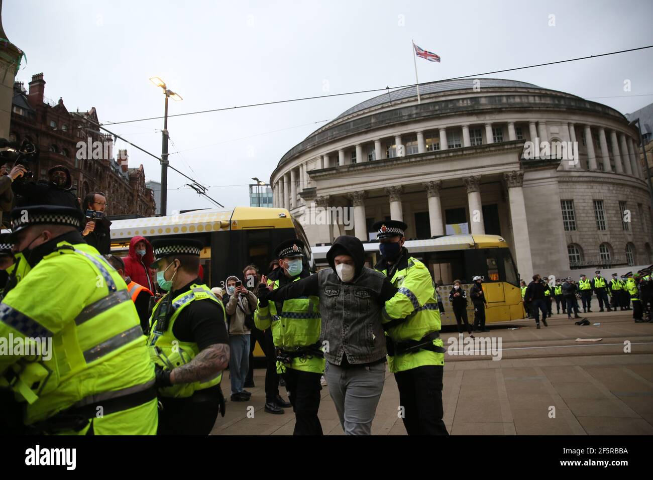 Manchester, UK. 27th March, 2021. Hundreds of protesters took to the ...