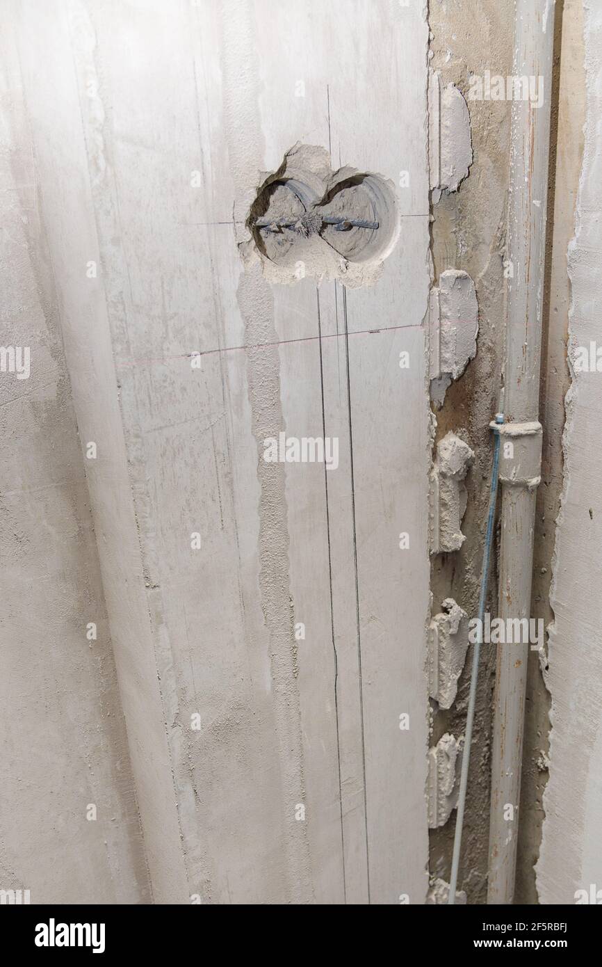 Holes in the wall for sockets. Electrical wiring in the wall. Repair ...