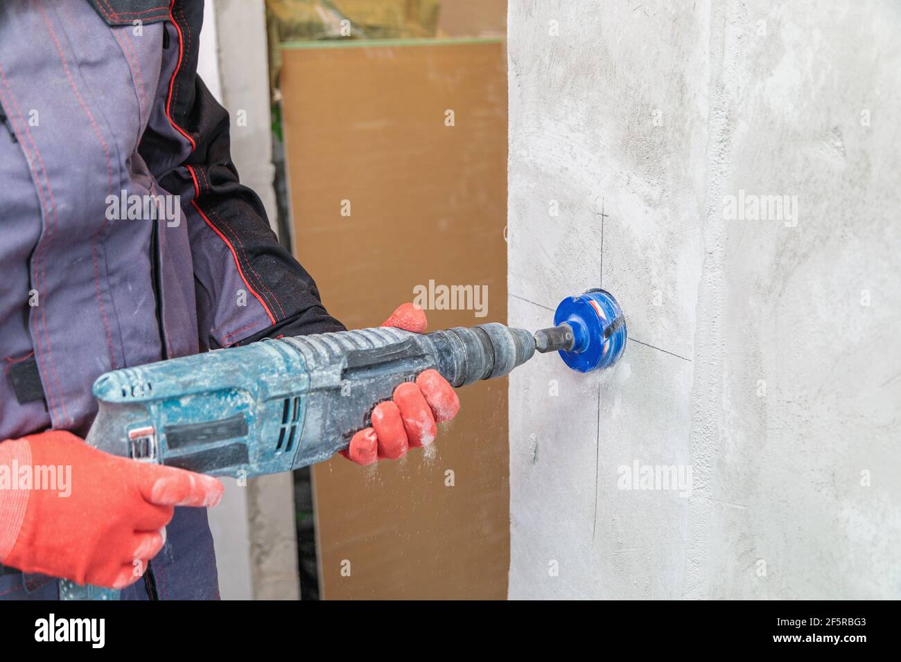 Worker drills holes bit hi-res stock photography and images - Alamy