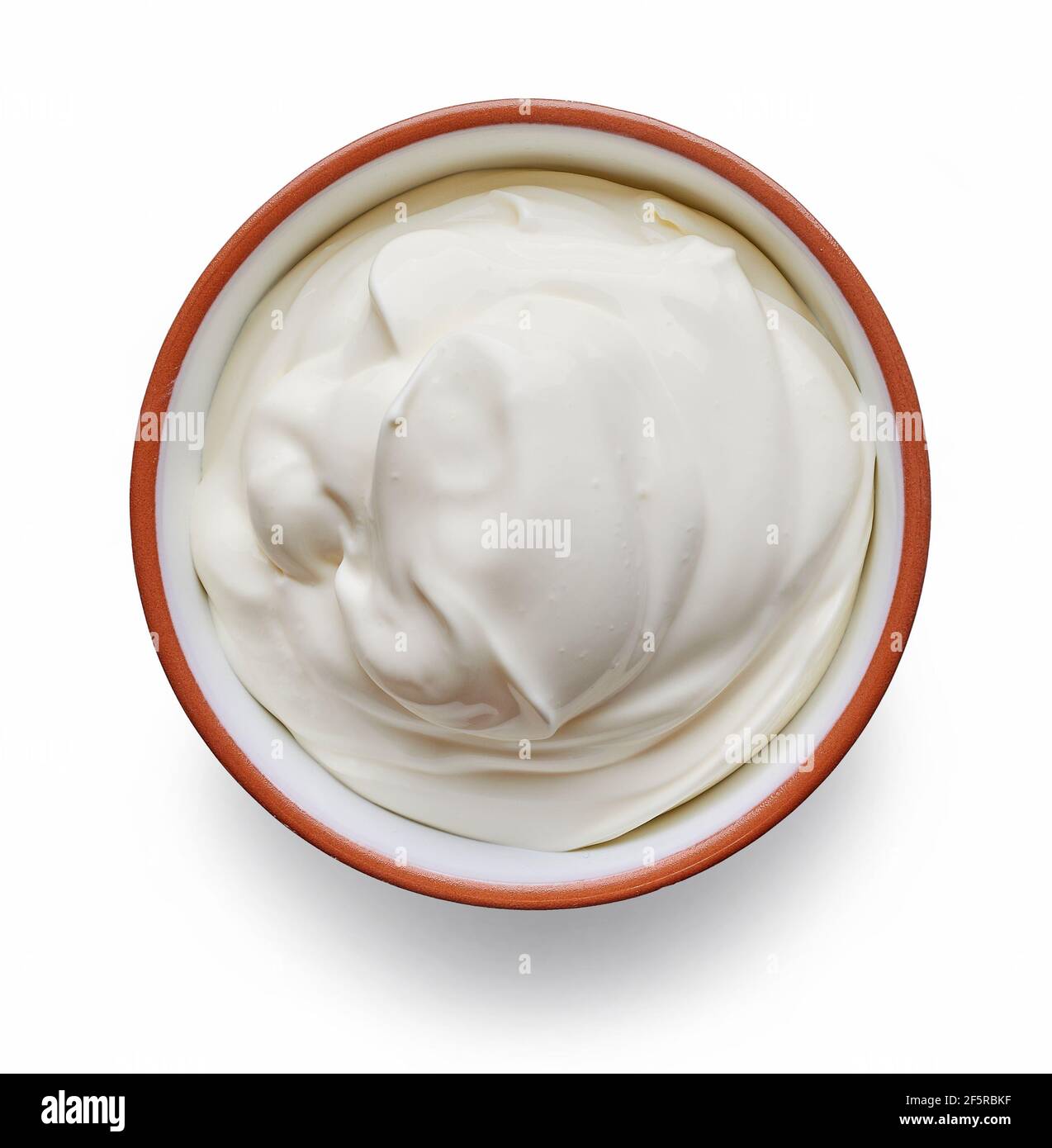 bowl of sour cream or greek yogurt isolated on white background, top ...