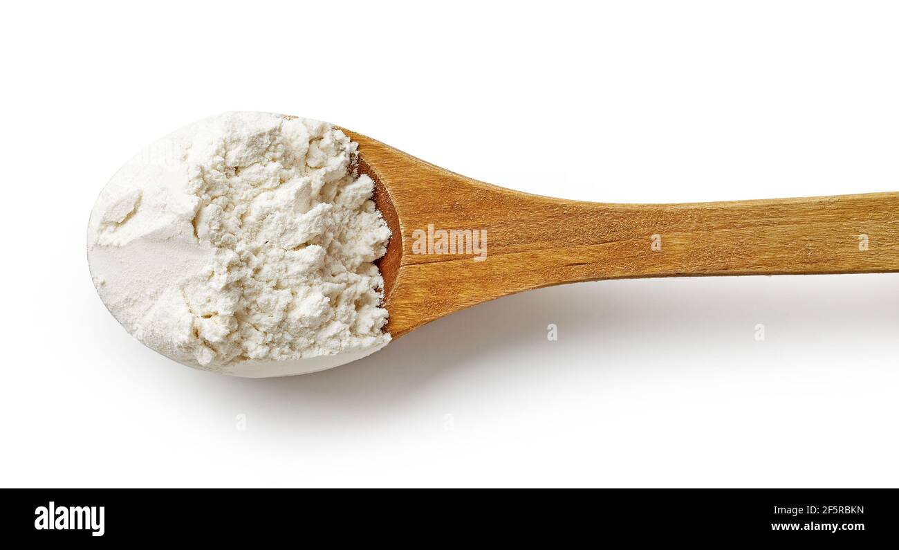 spoon of flour isolated on white background, top view Stock Photo - Alamy