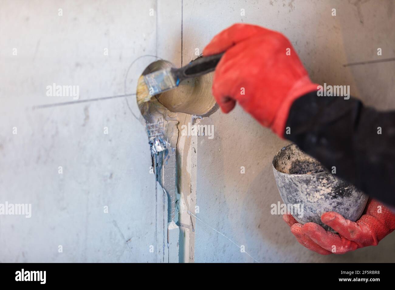 The electrician will prime the holes and channels for outlets and wires ...